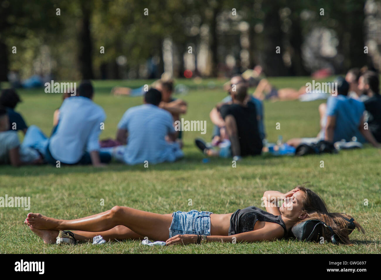 London, UK. 14th September, 2016. Workers and tourists enjoy sunbathing ...
