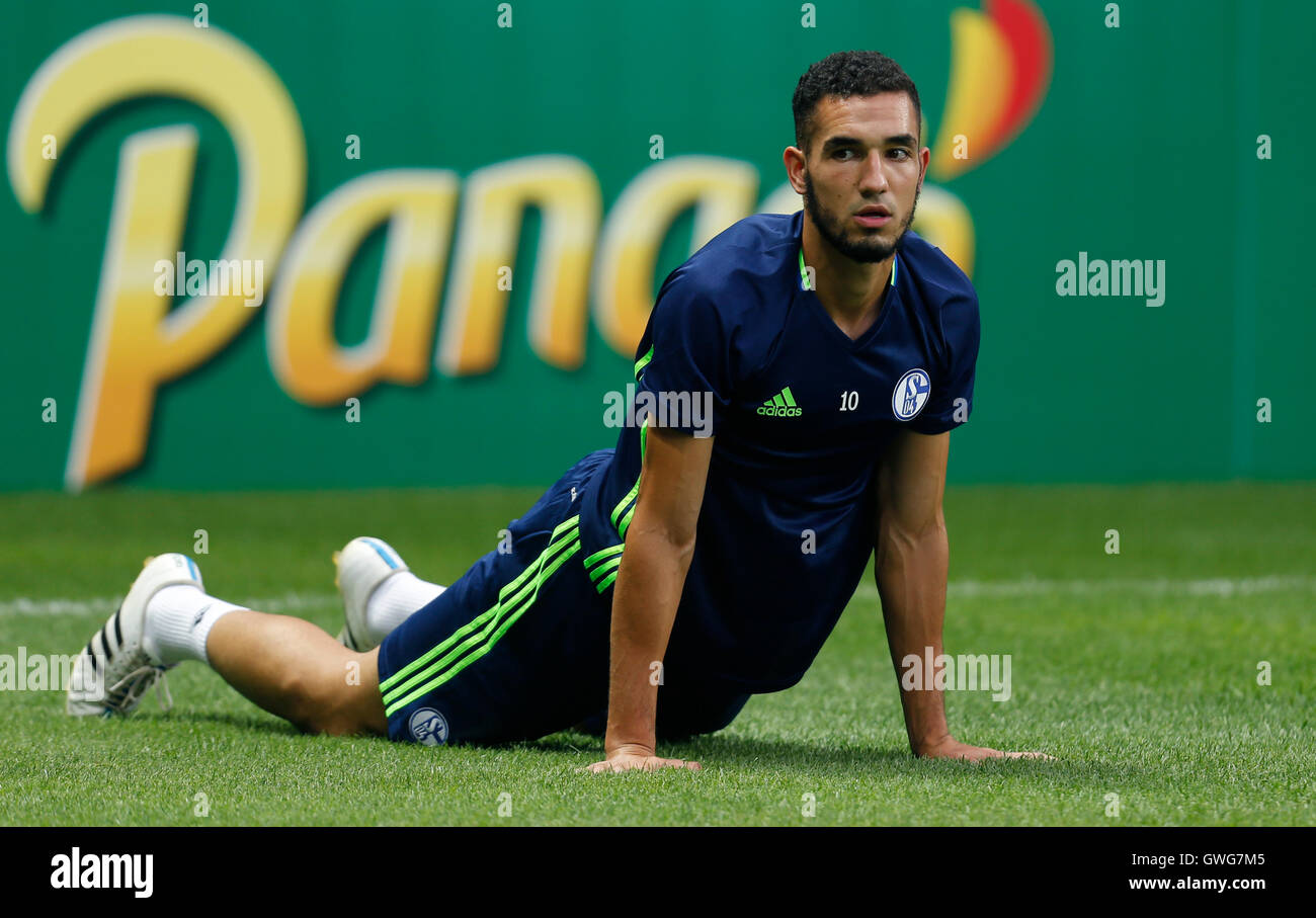 Nice, France. 14th Sep, 2016. Schalke's Nabil Bentaleb stretches during ...