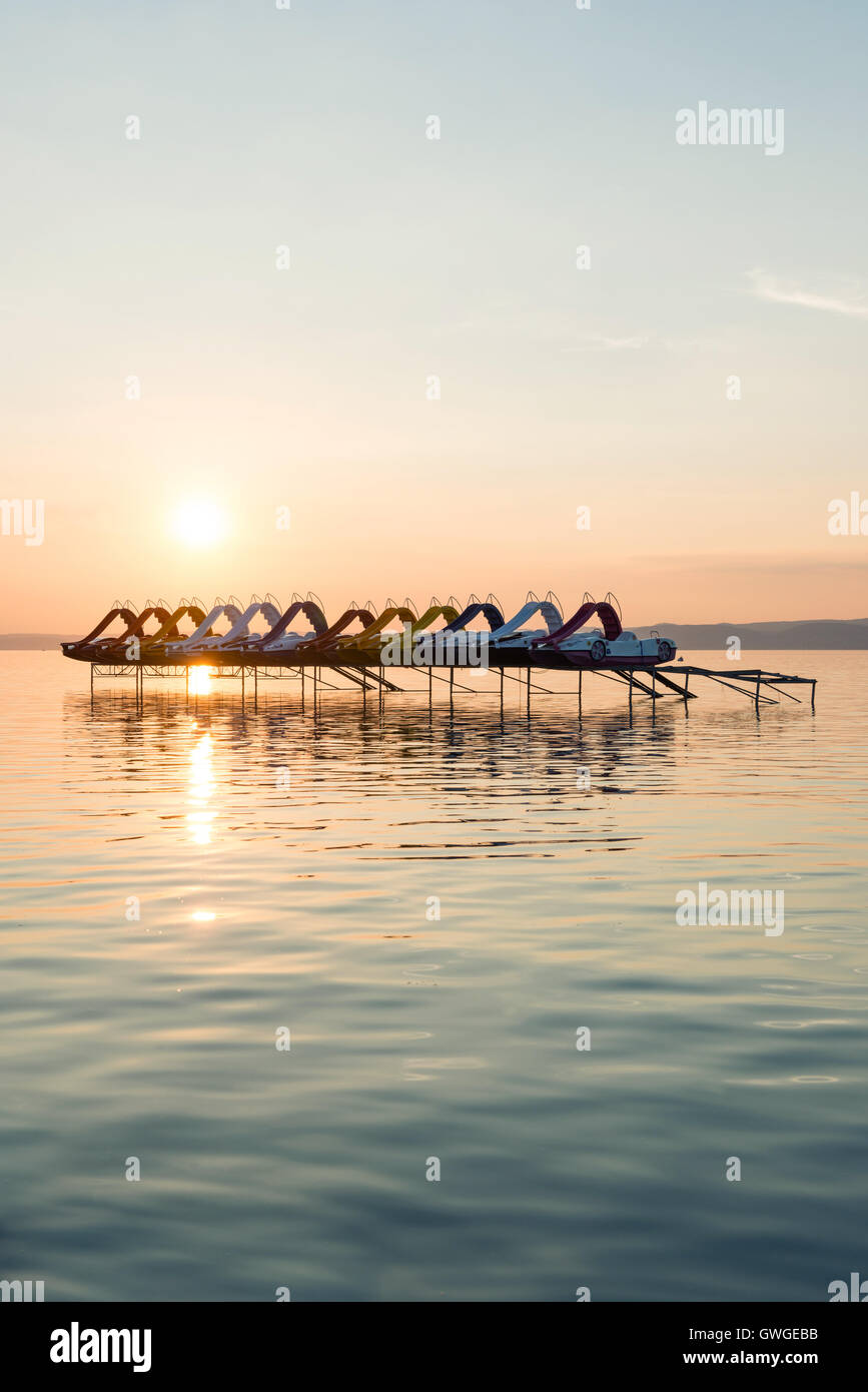 Sunset over paddle boats in the lake Balaton, Hungary Stock Photo - Alamy