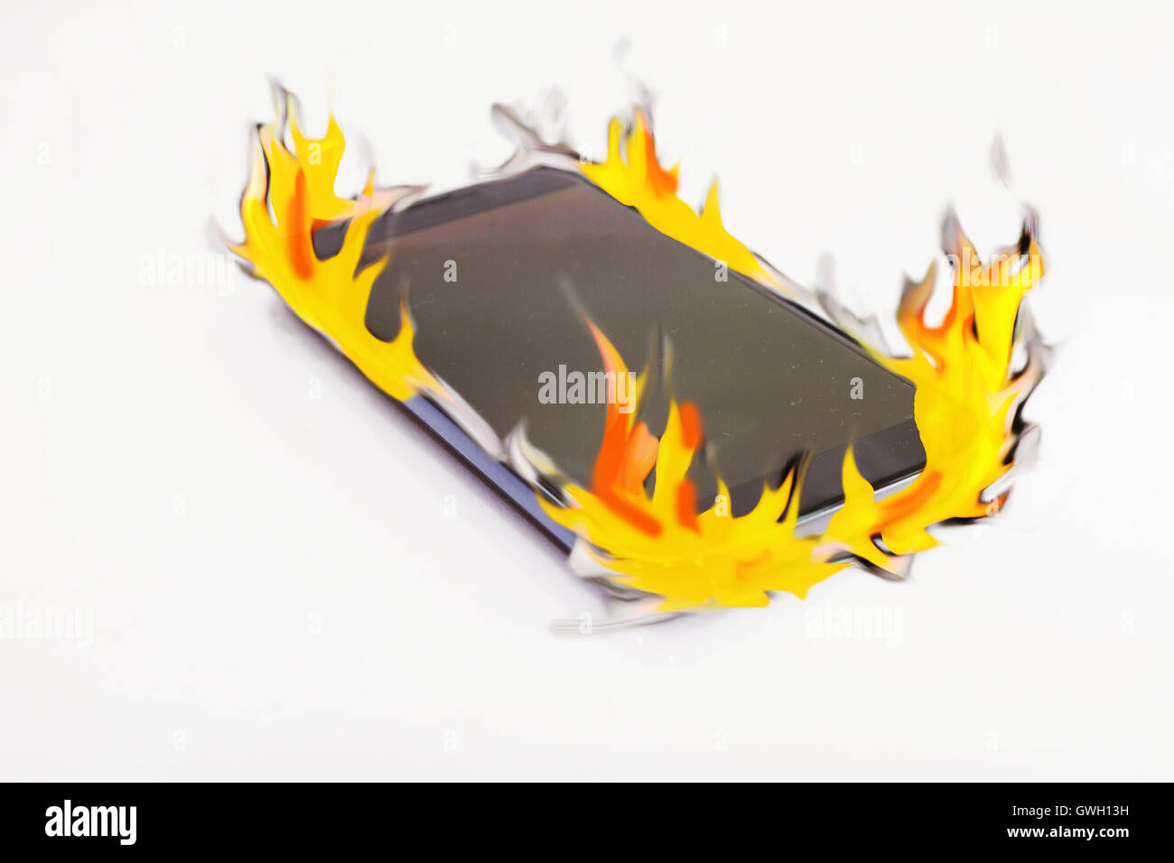 smart phone be burning / smart phone over heat Stock Photo - Alamy