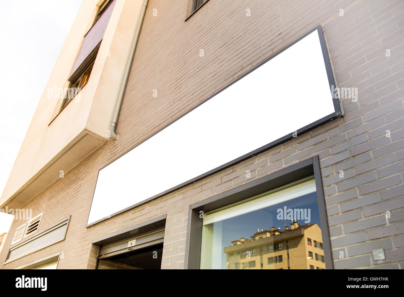 Rectangular street signboards mockup on brik wall Stock Photo - Alamy