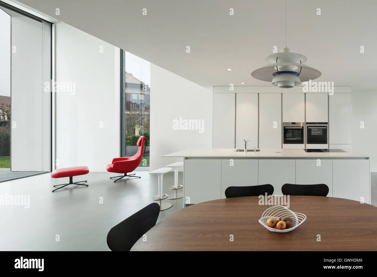 Interior of a beautiful modern house, wide domestic kitchen Stock Photo ...