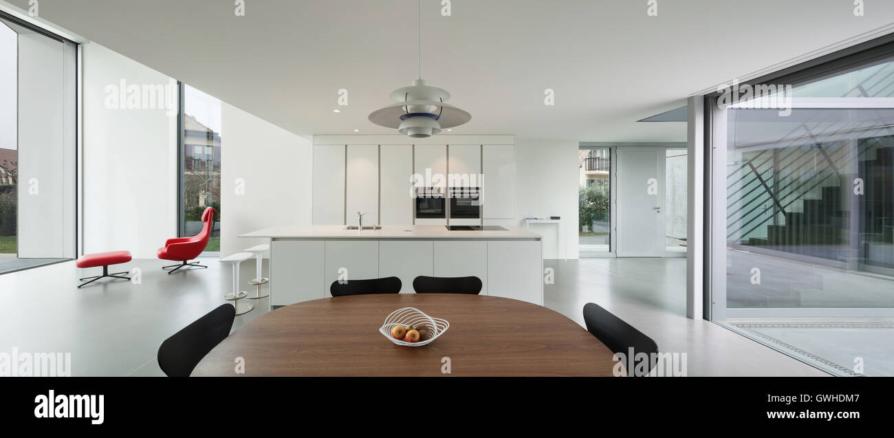 Interior of a beautiful modern house, wide domestic kitchen Stock Photo ...