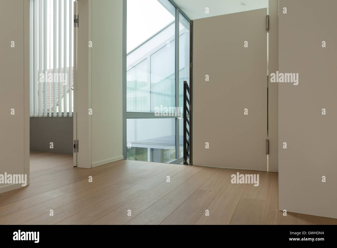 Interior of a modern loft, wide passage Stock Photo - Alamy