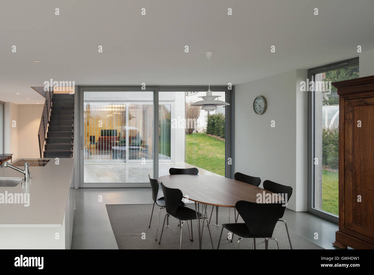 beautiful interiors of a modern house, dining table in kitchen Stock ...