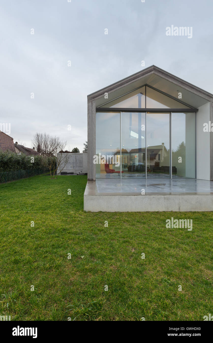 Exterior of a modern house, view from lawn Stock Photo - Alamy