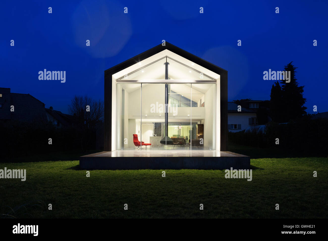 Exterior of a modern house, night scene Stock Photo - Alamy