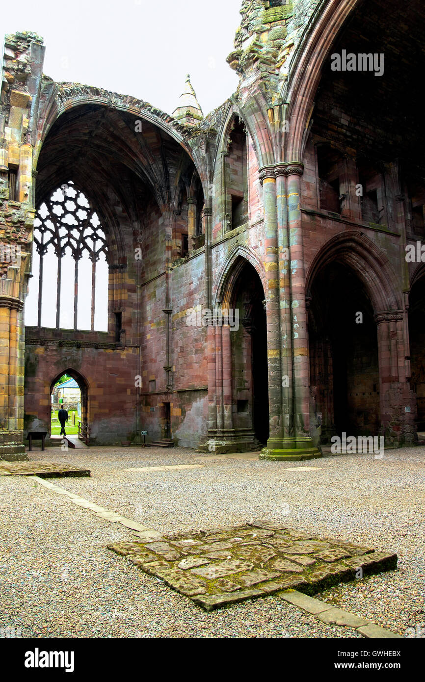 Ruins of Melrose Abbey, a Cistercian monastery in the Scottish Borders ...