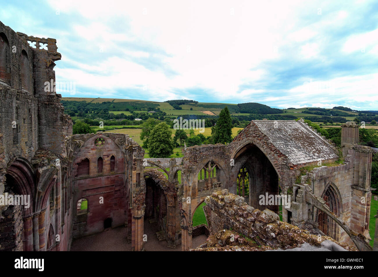 Ruins of Melrose Abbey, a Cistercian monastery in the Scottish Borders ...