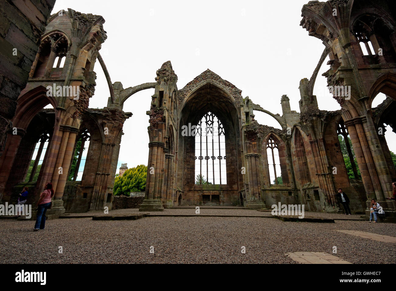 Ruins of Melrose Abbey, a Cistercian monastery in the Scottish Borders ...
