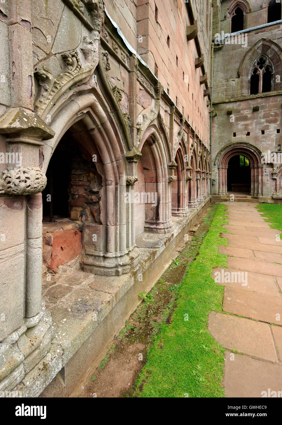 Ruins of Melrose Abbey, a Cistercian monastery in the Scottish Borders ...
