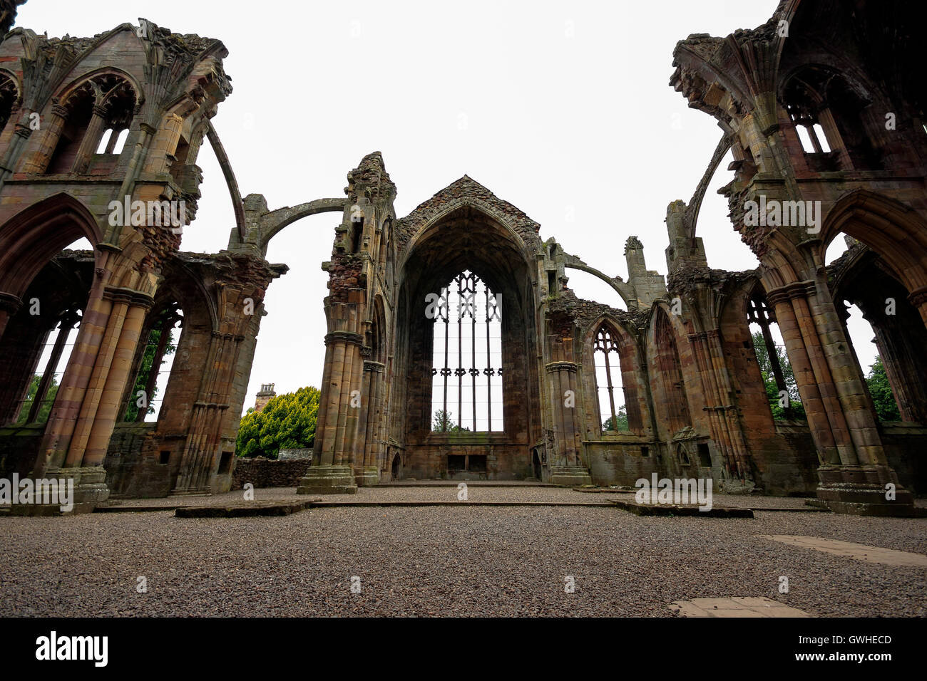Ruins of Melrose Abbey, a Cistercian monastery in the Scottish Borders ...