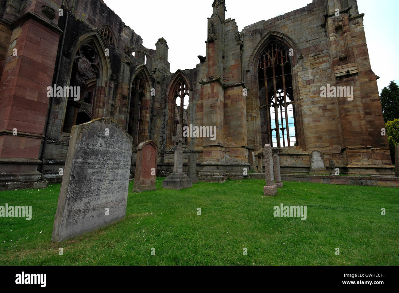 Ruins of Melrose Abbey, a Cistercian monastery in the Scottish Borders ...