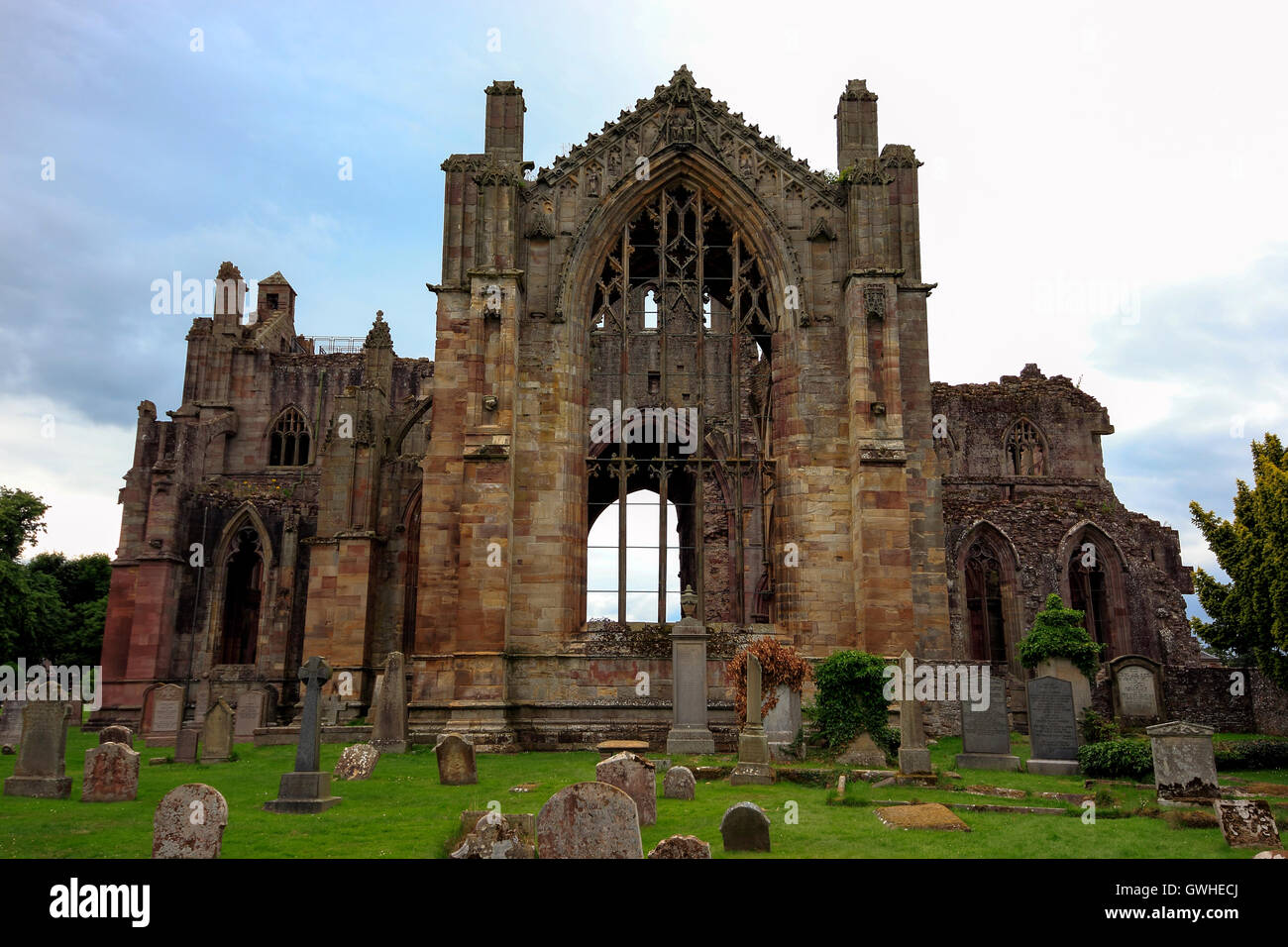Ruins of Melrose Abbey, a Cistercian monastery in the Scottish Borders ...
