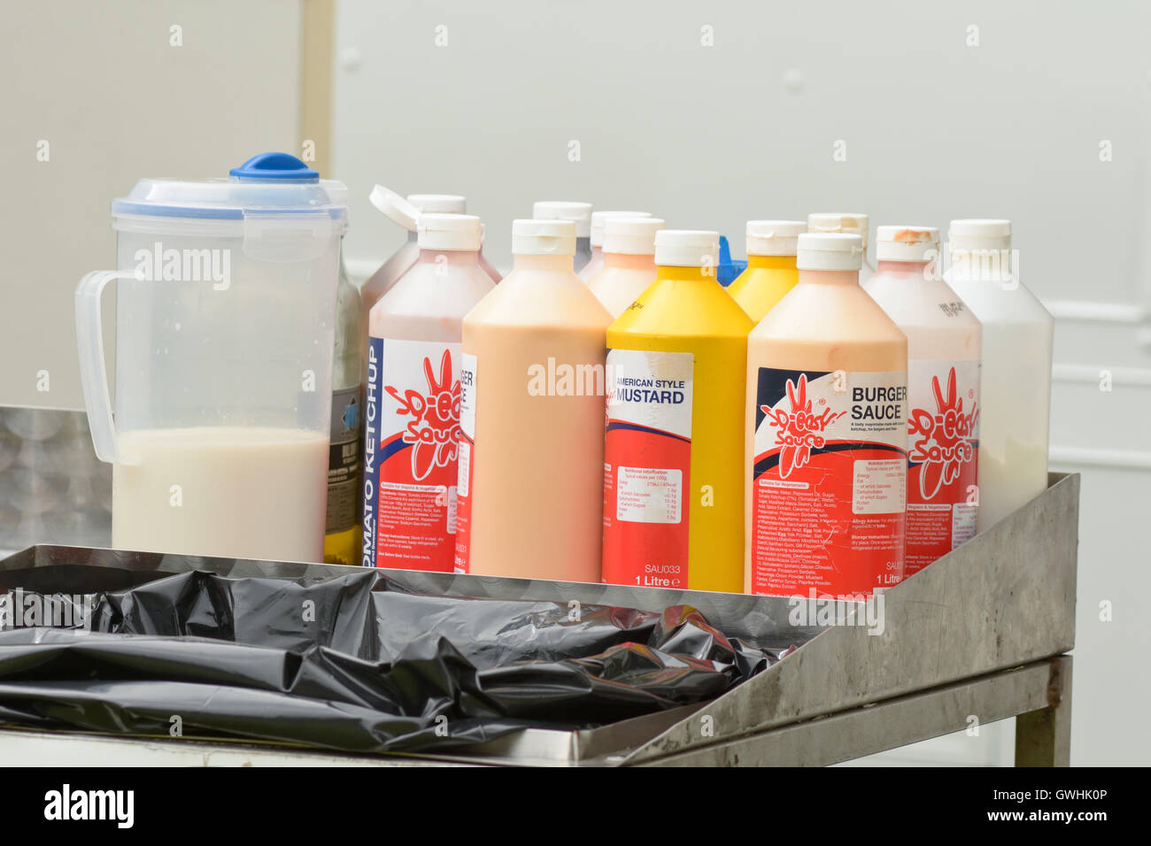 Condiments in bottles at food stall at The River Festival in Bedford ...