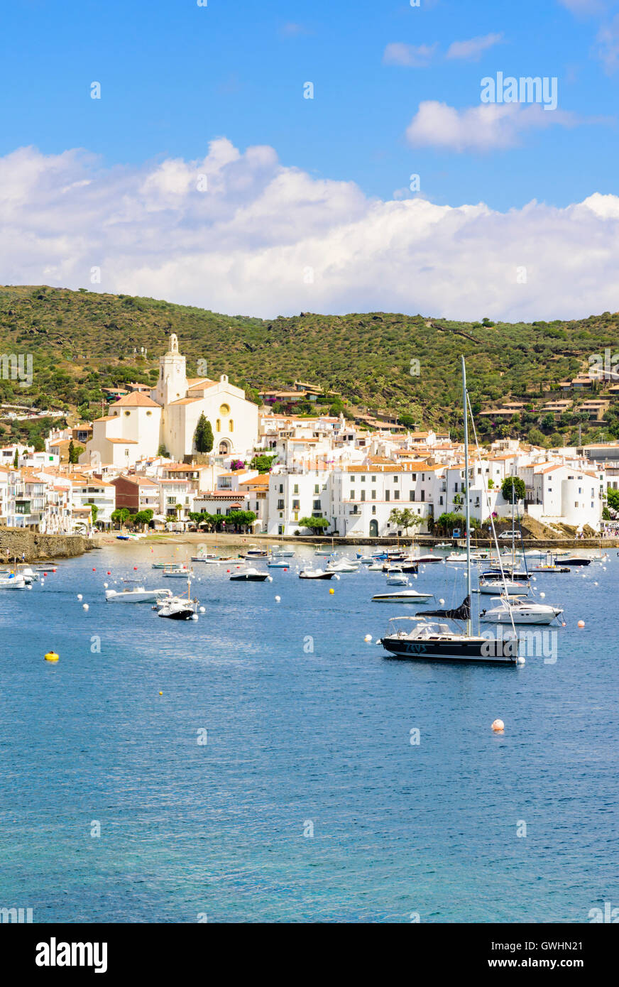 Whitewashed Cadaques town, Spain, topped by the Church of Santa Maria ...