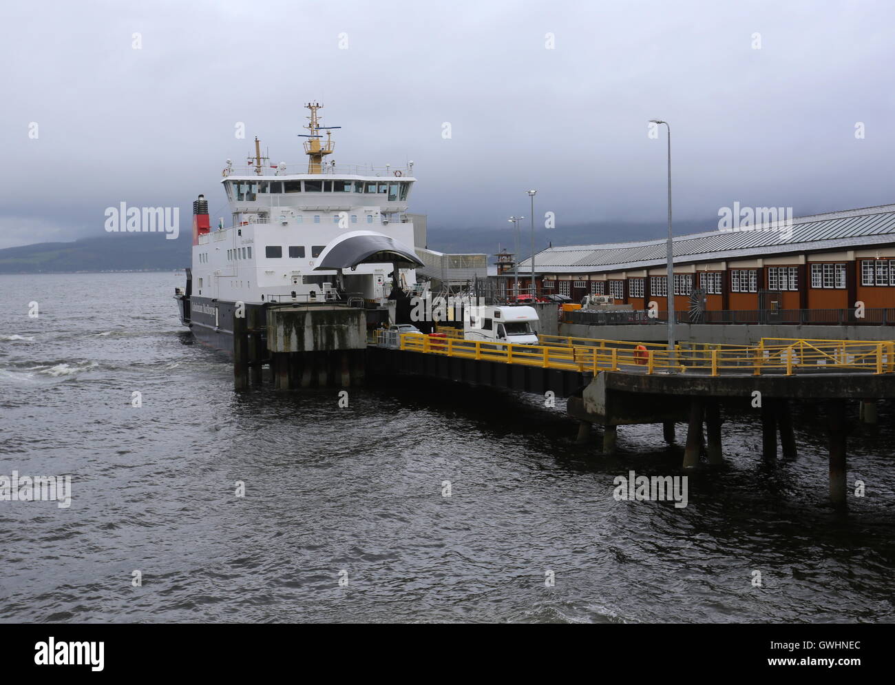 Vehicles driving off Calmac ferry MV Bute docked Wemyss Bay Scotland ...