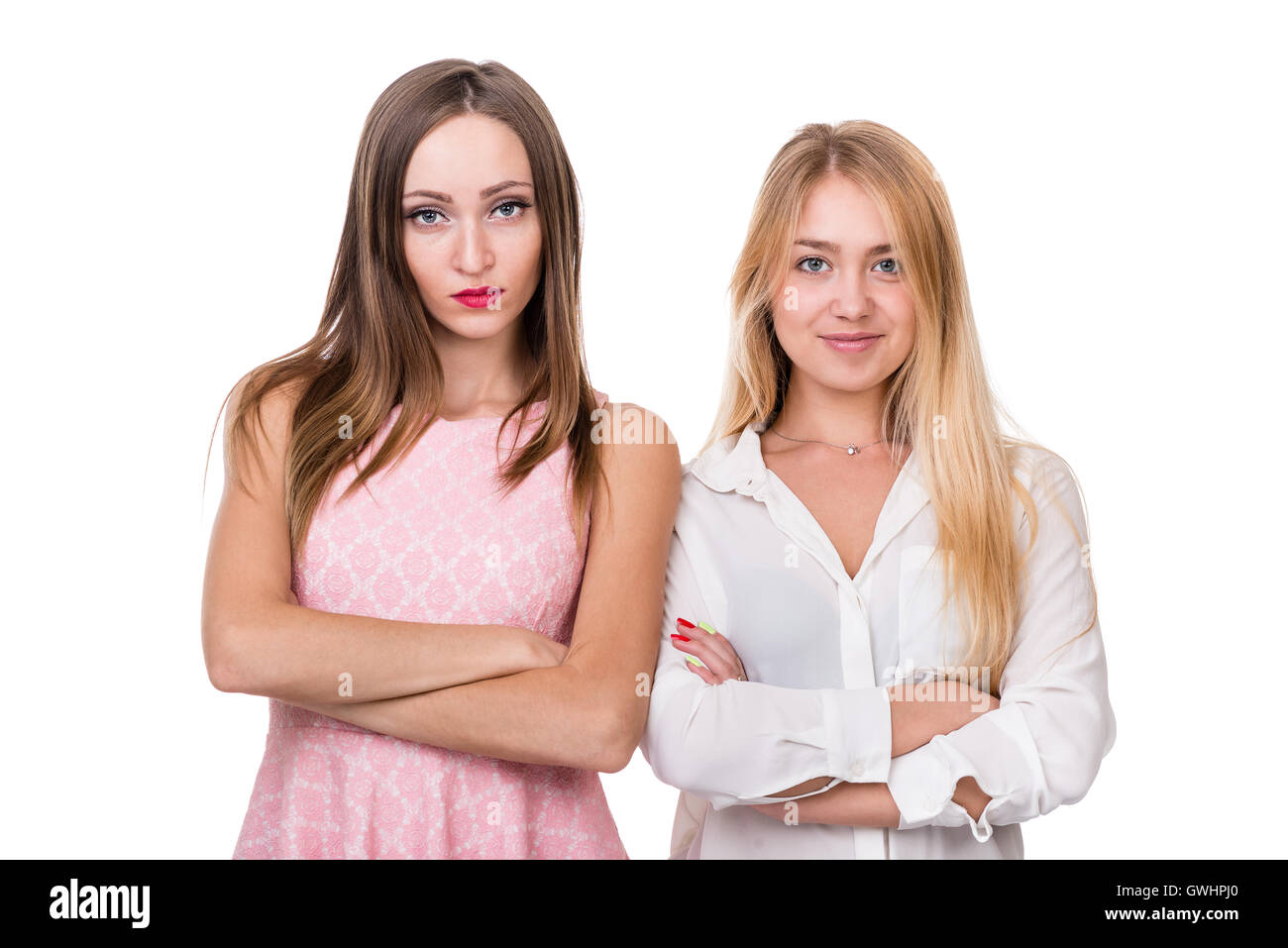 Two young women with different emotions isolated on white Stock Photo ...
