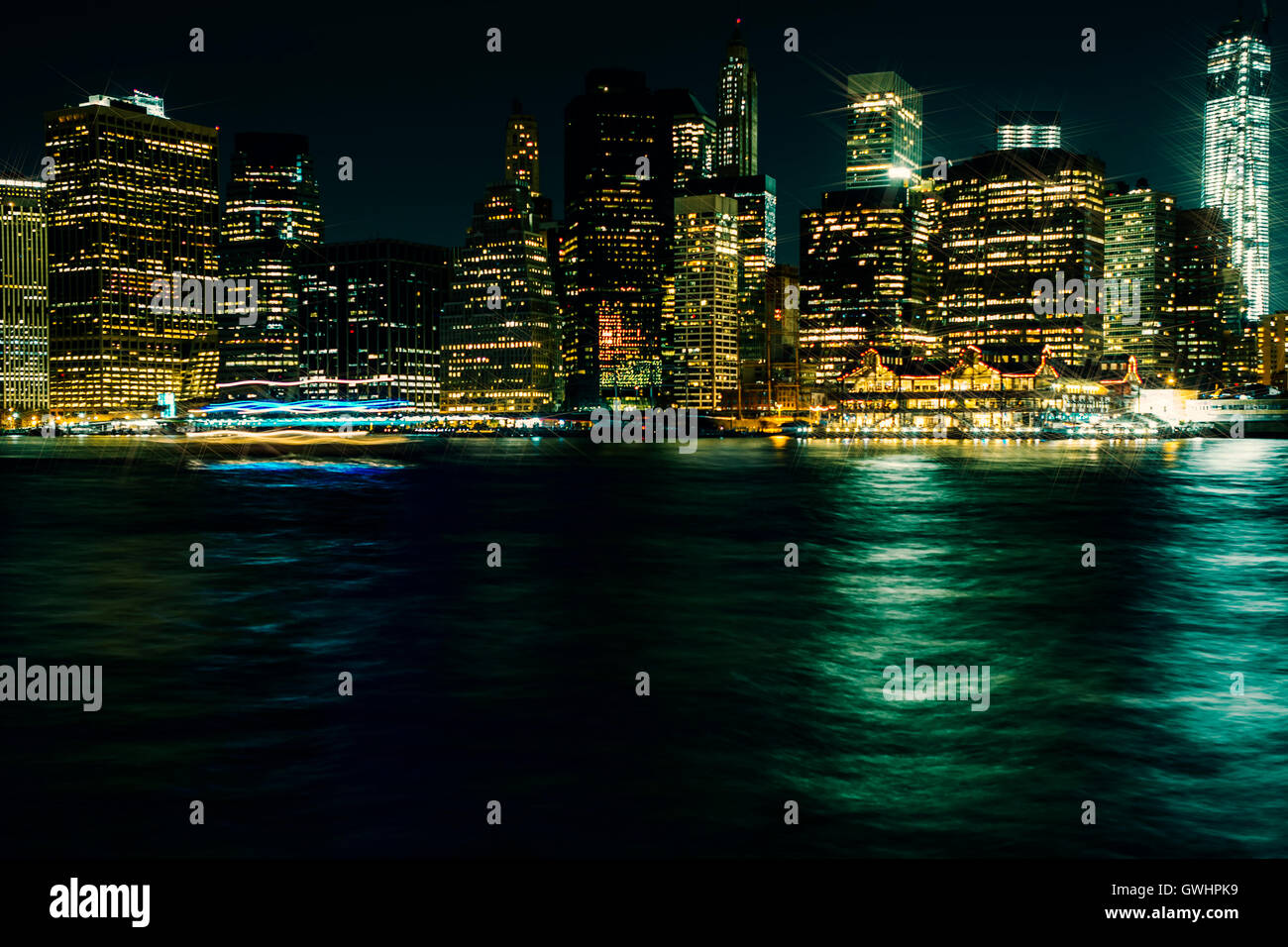 Bright lights of New York City at night Stock Photo - Alamy