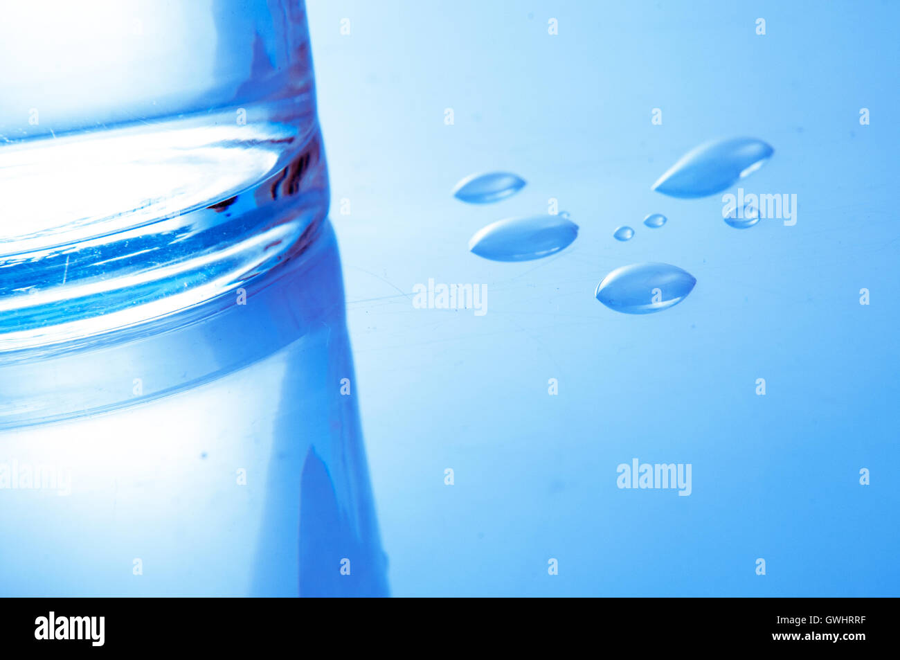 Half water glass Stock Photo - Alamy