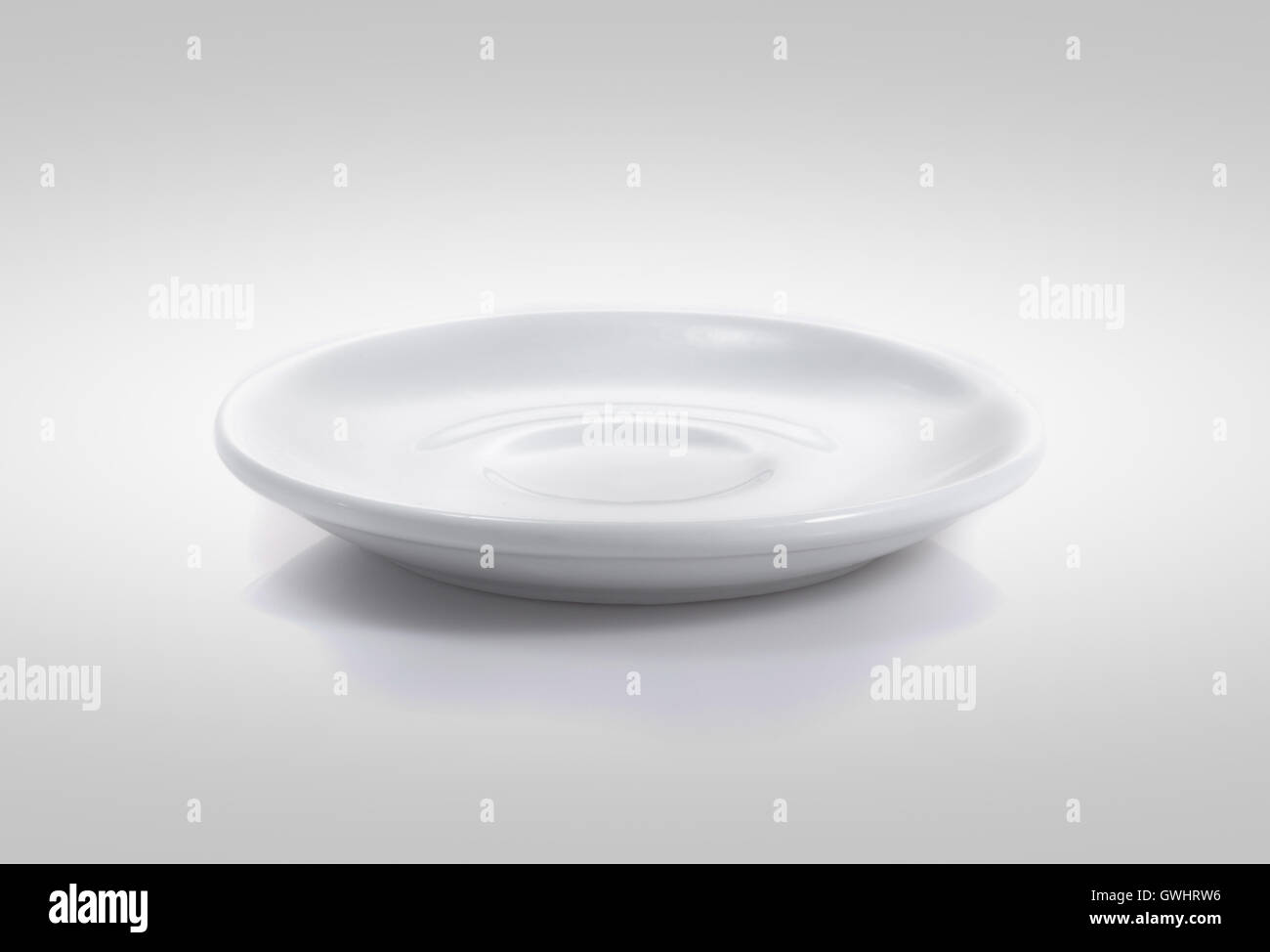 saucer isolated on a white background Stock Photo - Alamy