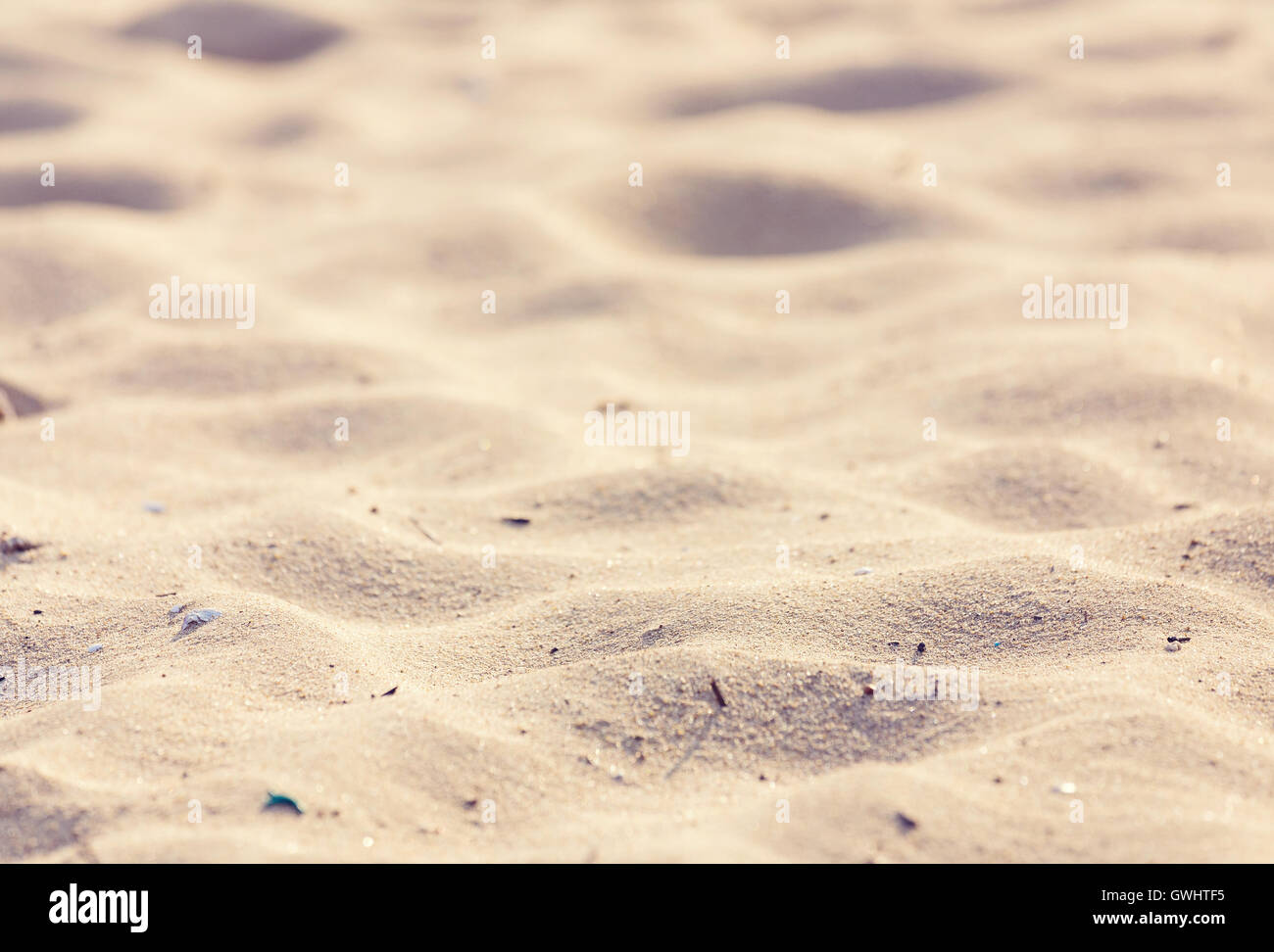Sand beach background Stock Photo - Alamy