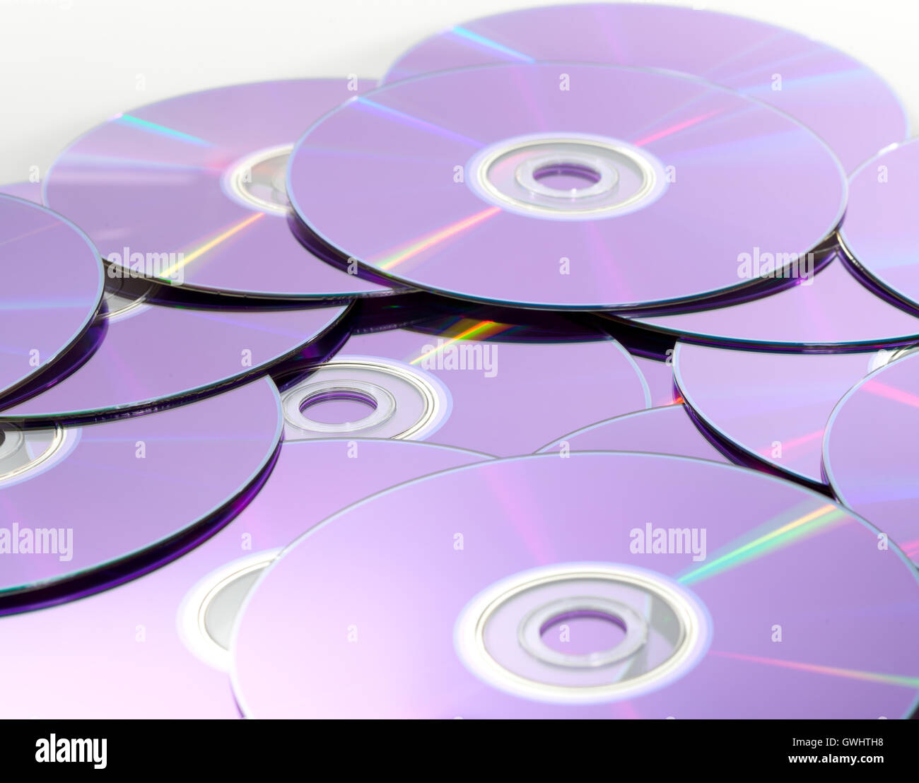 large group of dvds isolated on a white background Stock Photo - Alamy