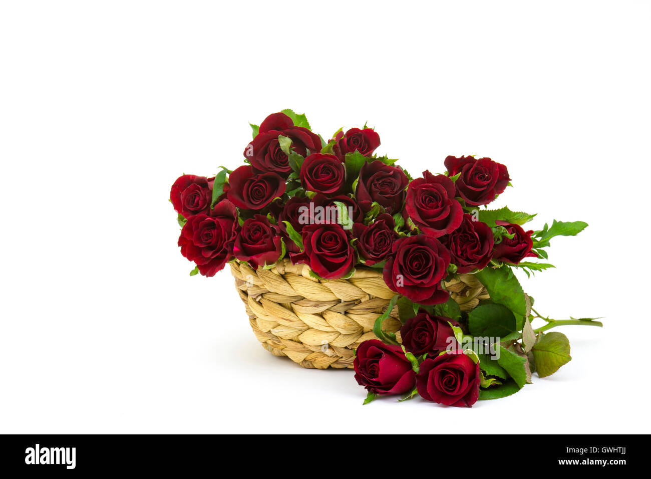 red roses in a basket Stock Photo - Alamy