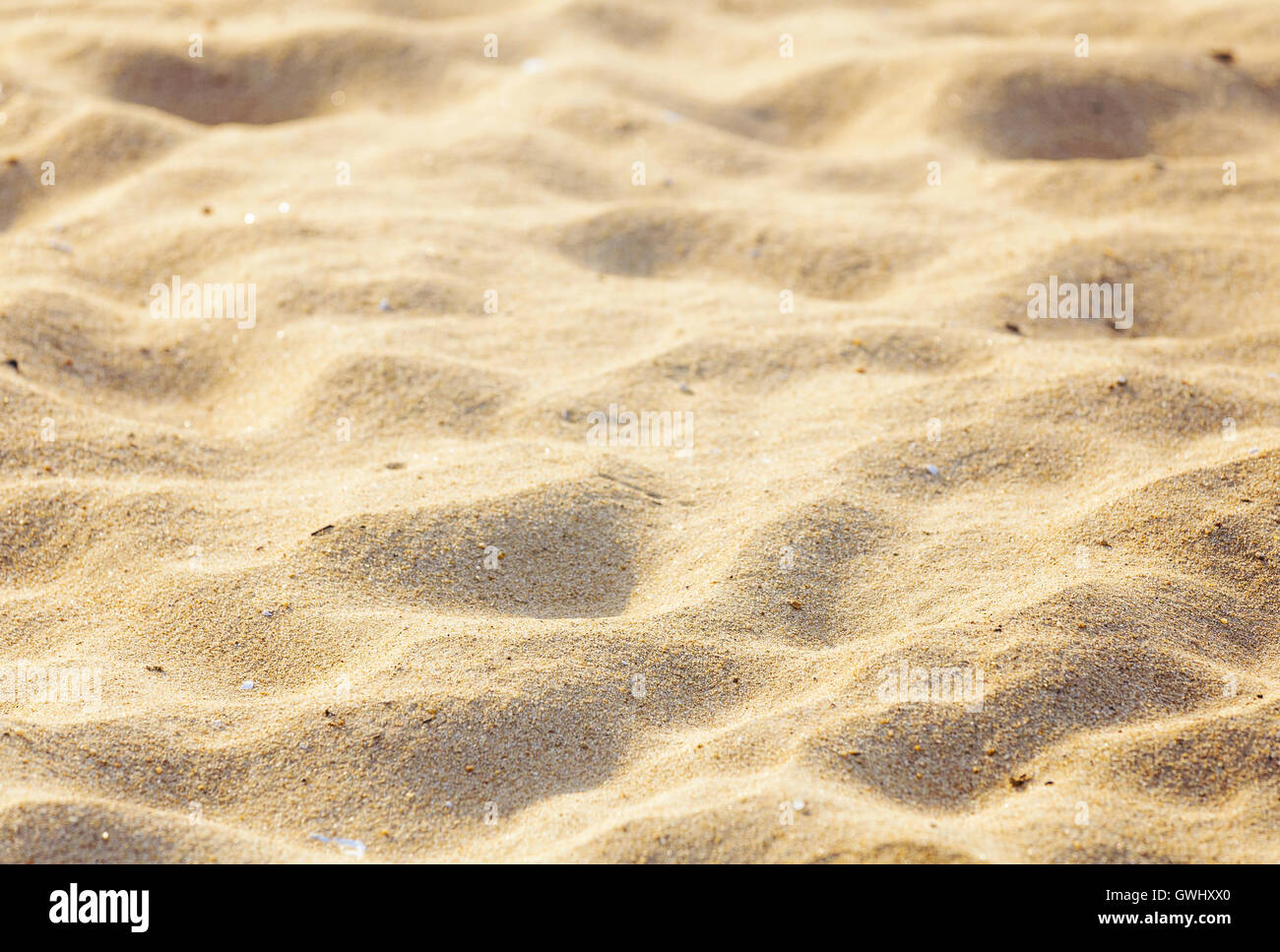 Sand beach background Stock Photo - Alamy
