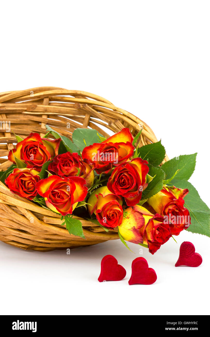 red and yellow roses in a basket Stock Photo - Alamy