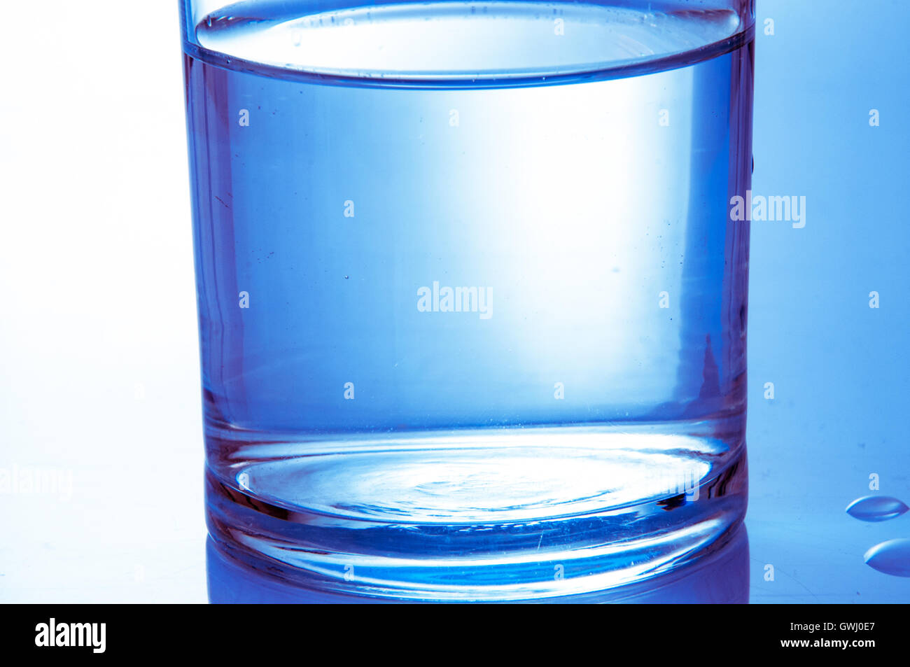 Half water glass Stock Photo - Alamy
