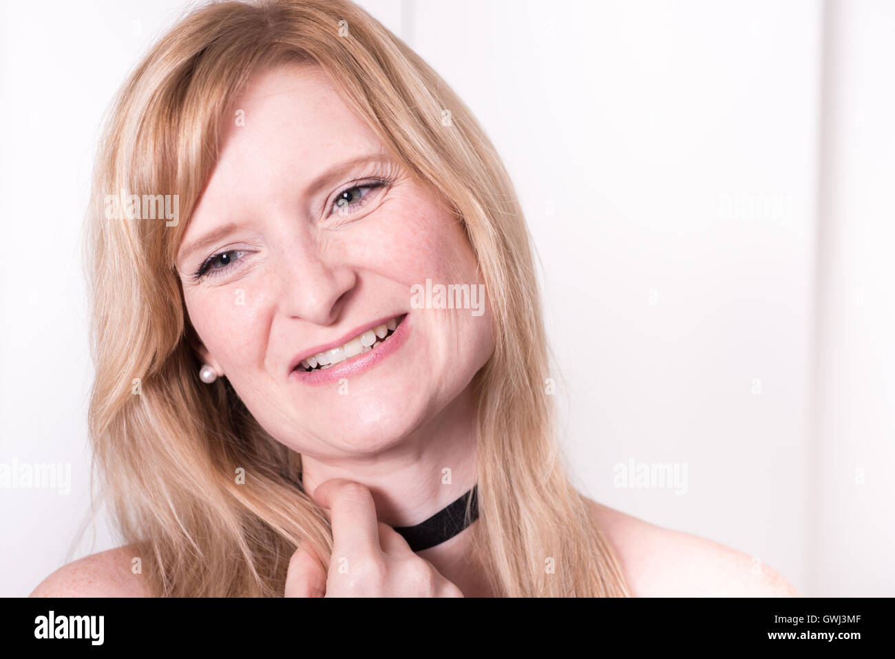 beautiful blonde woman is smiling - Portrait close up Stock Photo - Alamy beautiful blonde woman is smiling - Portrait close up Stock Photo - Alamy