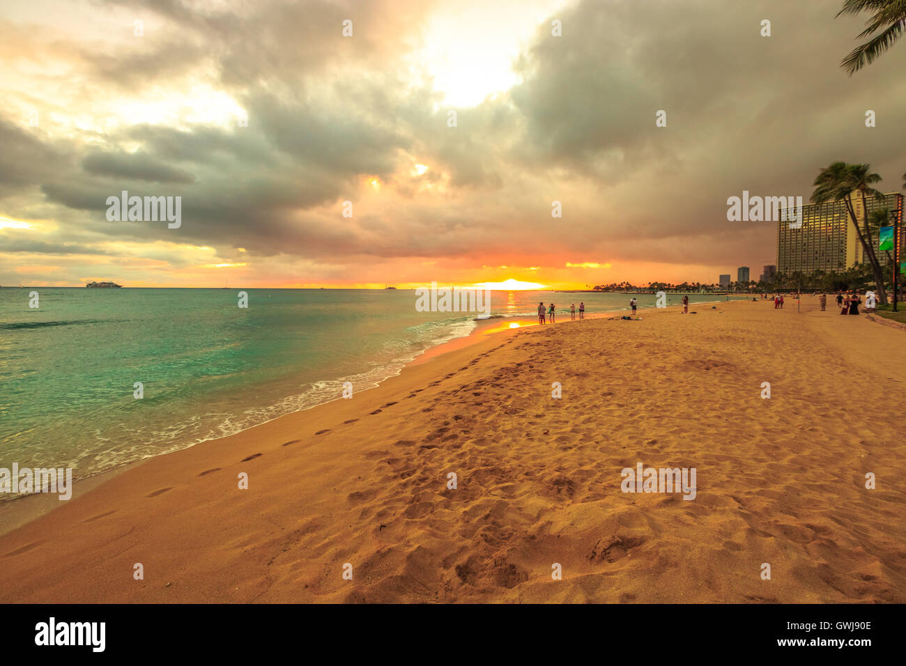 Waikiki beach sunset Stock Photo - Alamy
