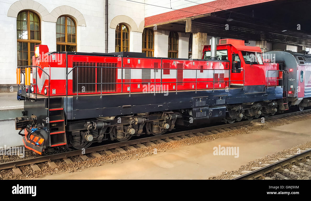 Passenger train on the station platform Stock Photo - Alamy