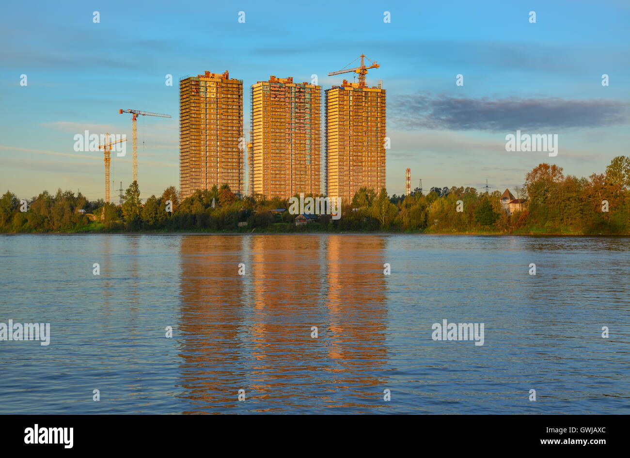New high-rise buildings on the river Bank Stock Photo - Alamy