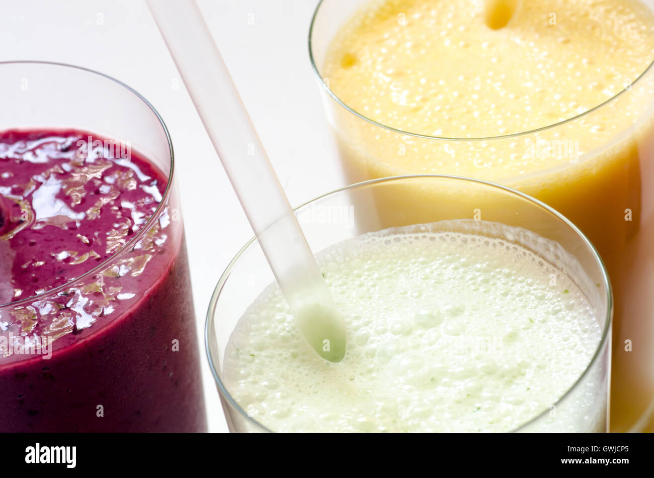 fruit smoothie in glass closeup Stock Photo - Alamy