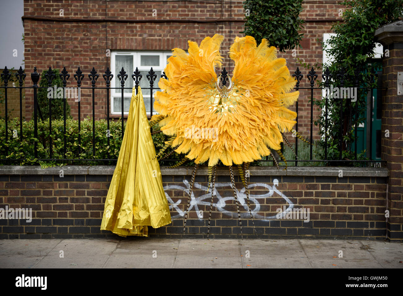 Carnival costume hanging on the fence early in the morning while it's ...