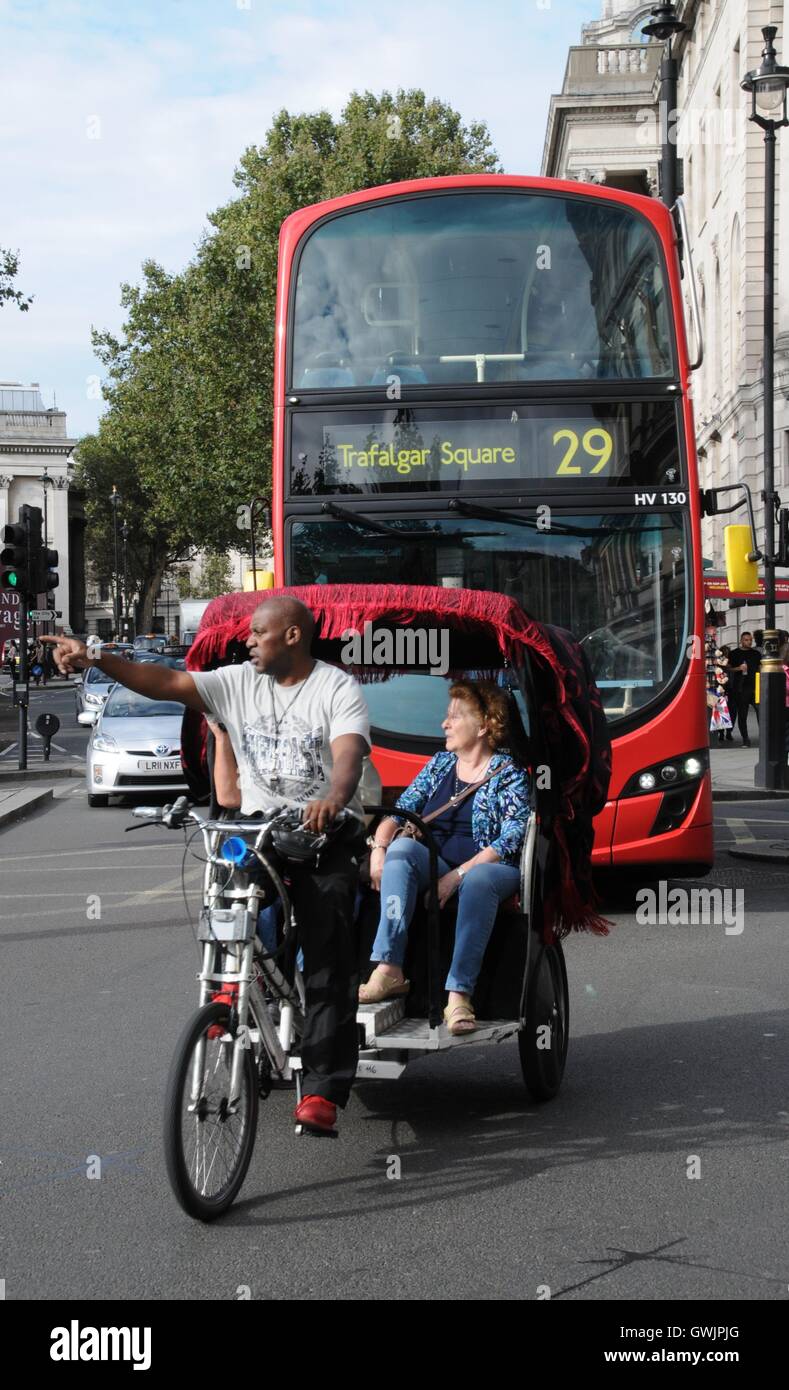 Rickshaw drivers and a bus hi-res stock photography and images - Alamy