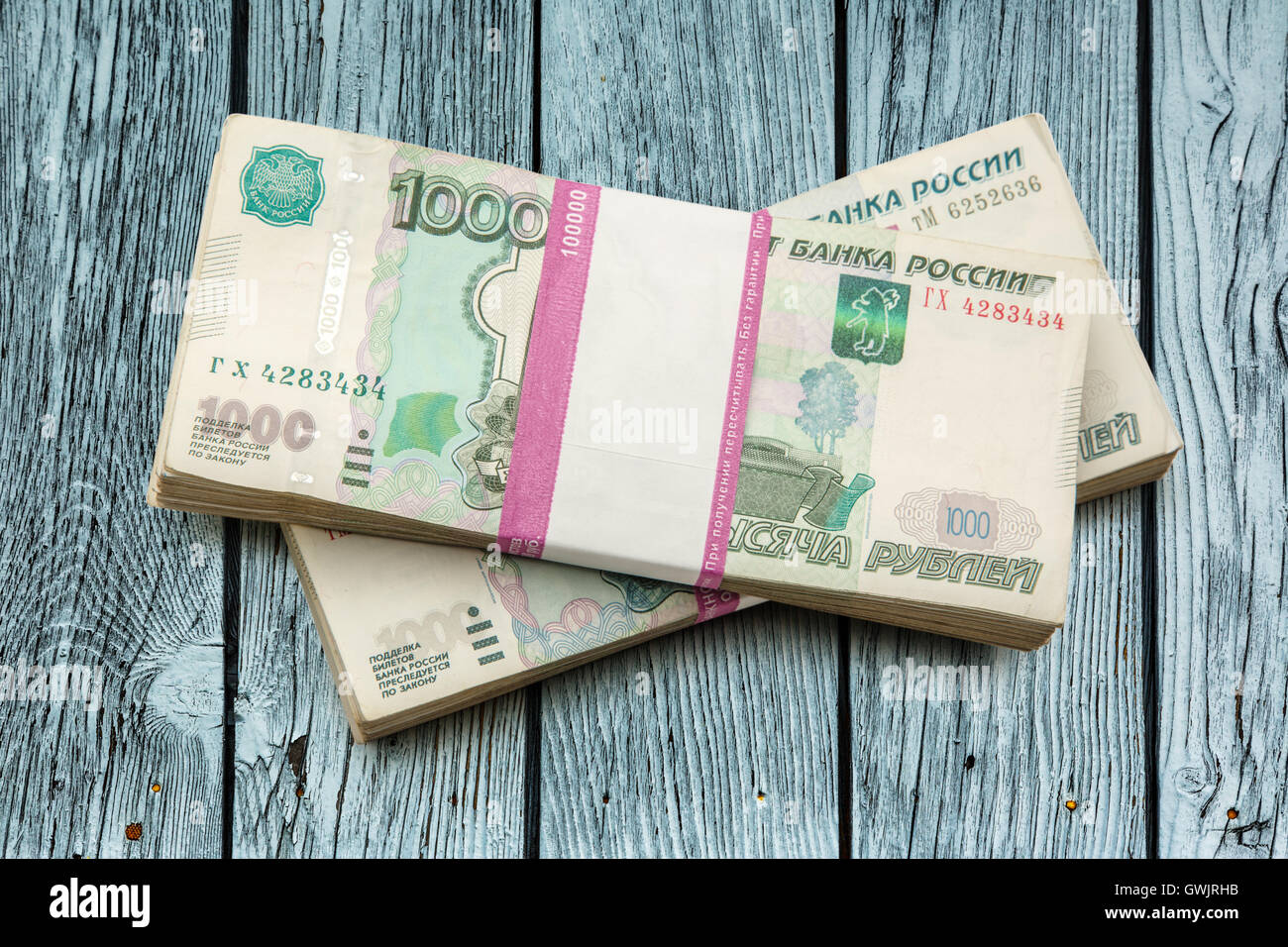 Pile money in wrapper in hi-res stock photography and images - Alamy