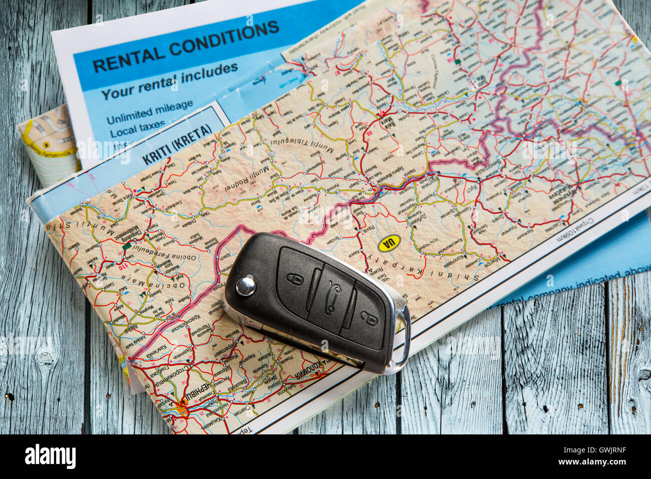 Car remote key on map and rental agreement Stock Photo - Alamy