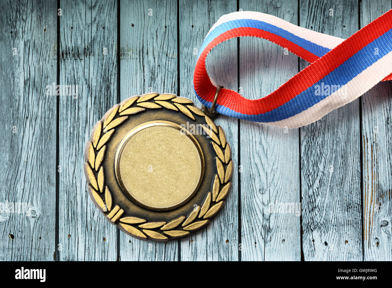 Metal medal with tricolor ribbon in closeup Stock Photo - Alamy