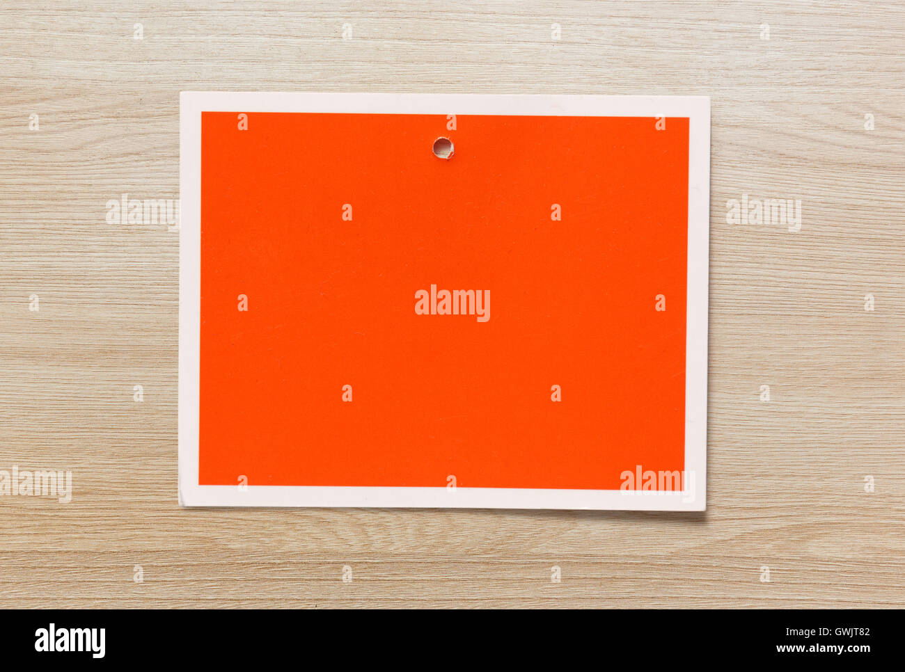 Blank red card on the wooden background Stock Photo - Alamy