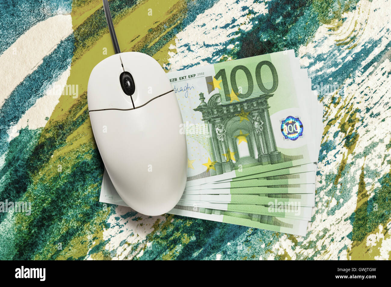 Computer mouse and one hundred euro banknotes Stock Photo - Alamy