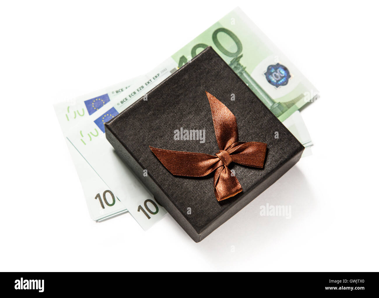 Gift box with one hundred euro banknotes Stock Photo - Alamy