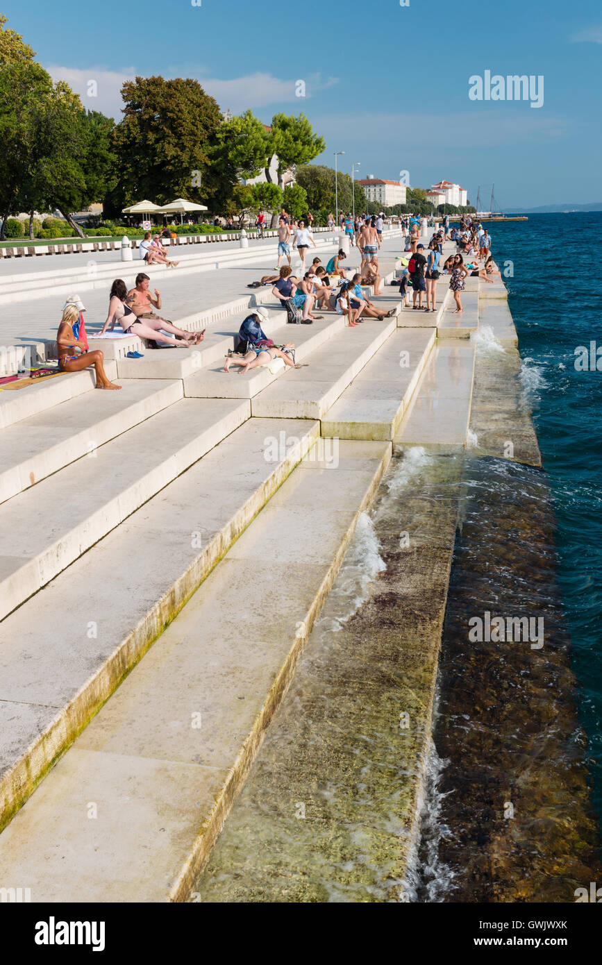 ZADAR, CROATIA - SEPTEMBER 1, 2016: People visit famous sea organ and ...