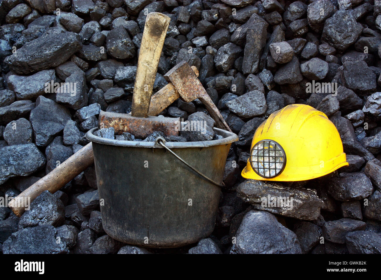 Mining tools on a background of coal Stock Photo - Alamy