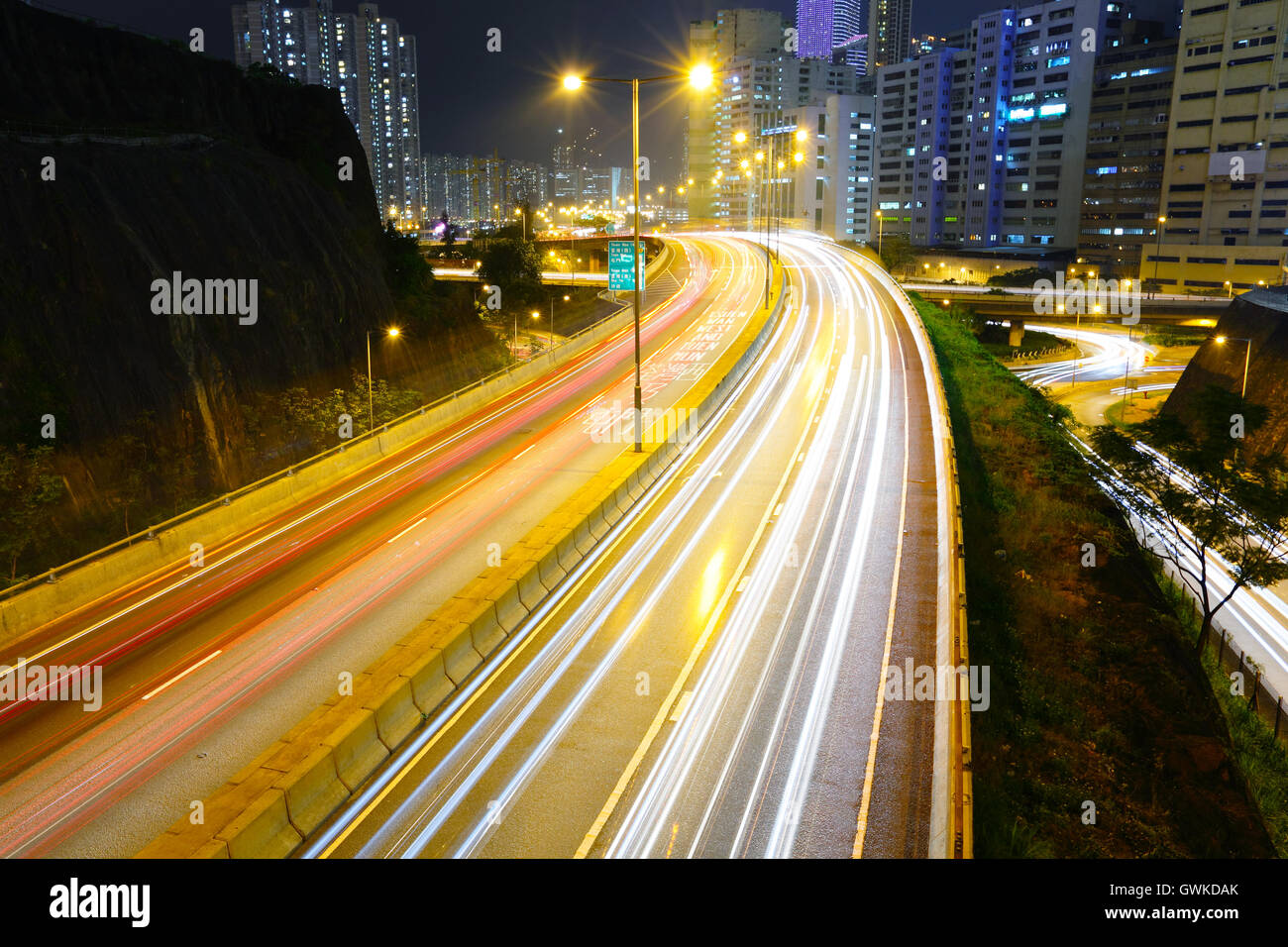 Busy traffic on highway at night Stock Photo - Alamy
