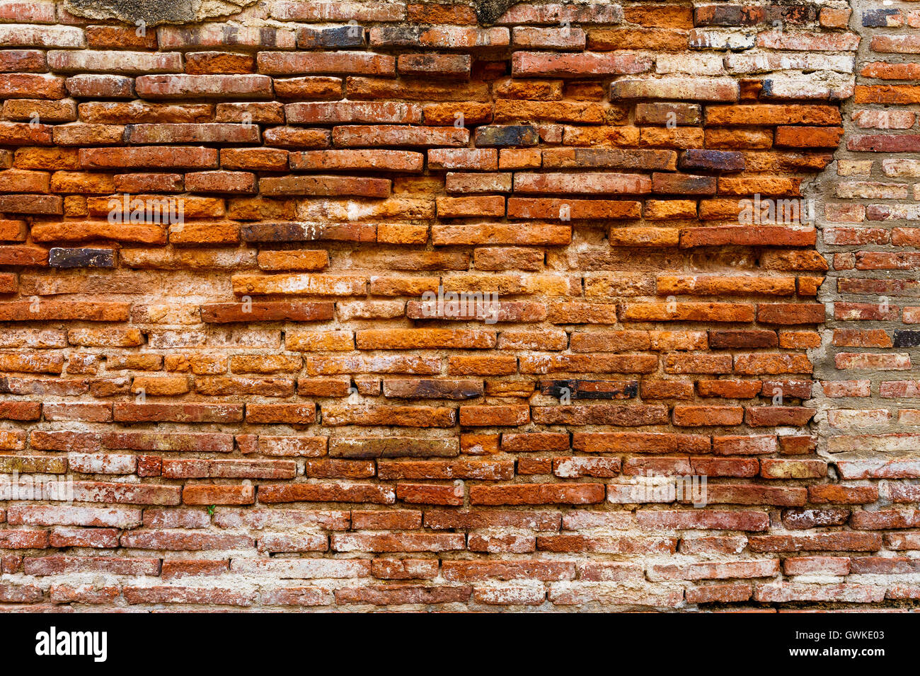 Ancient brick wall in red color Stock Photo - Alamy
