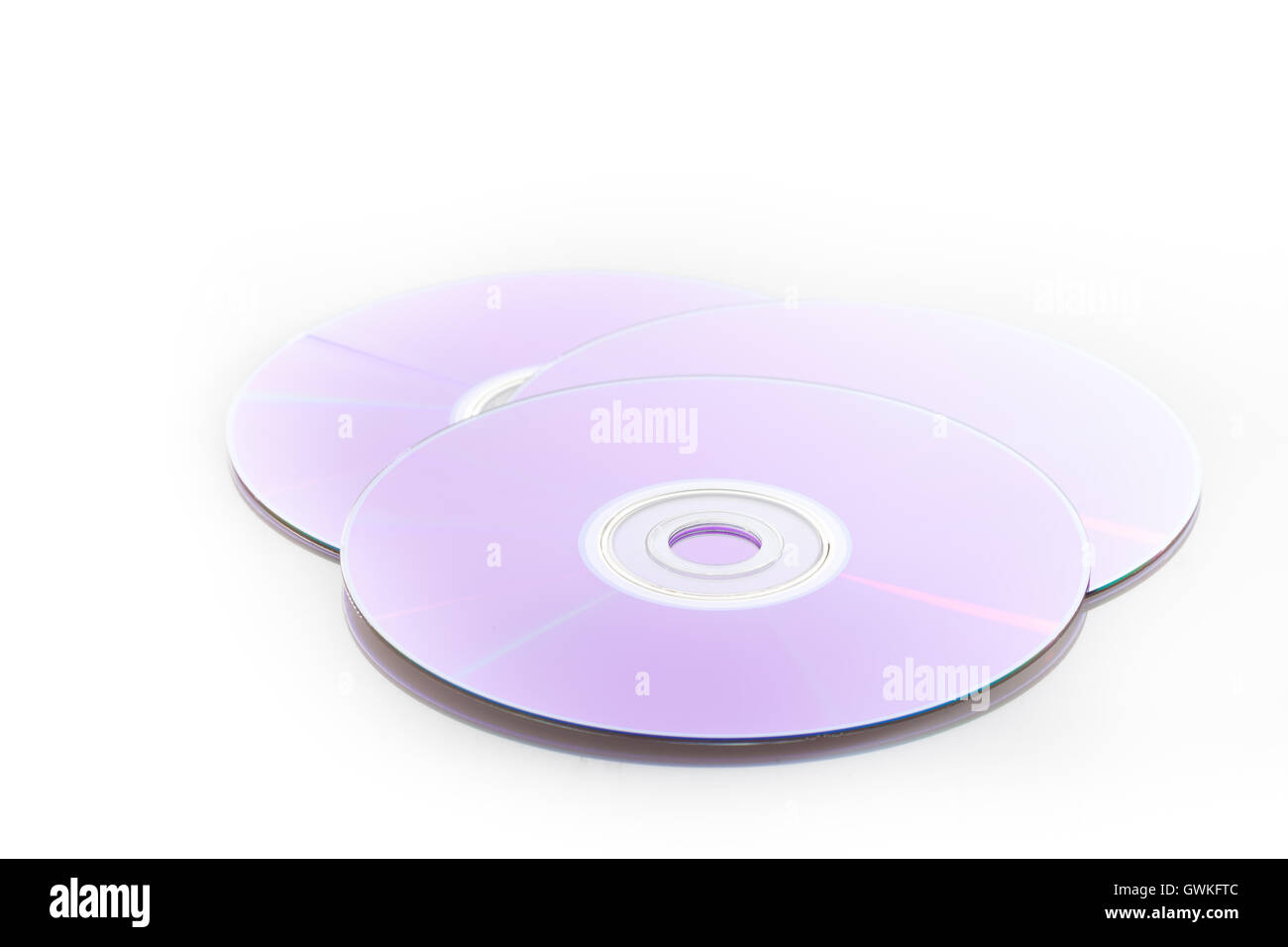 three dvds isolated on a white background Stock Photo - Alamy