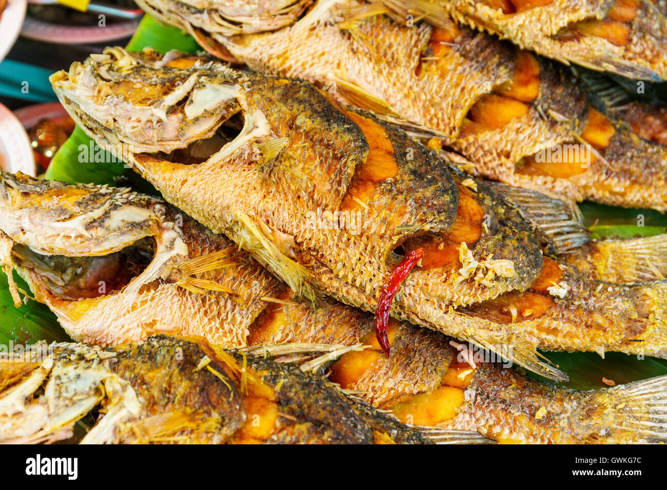 Roasted fish for sell Stock Photo - Alamy
